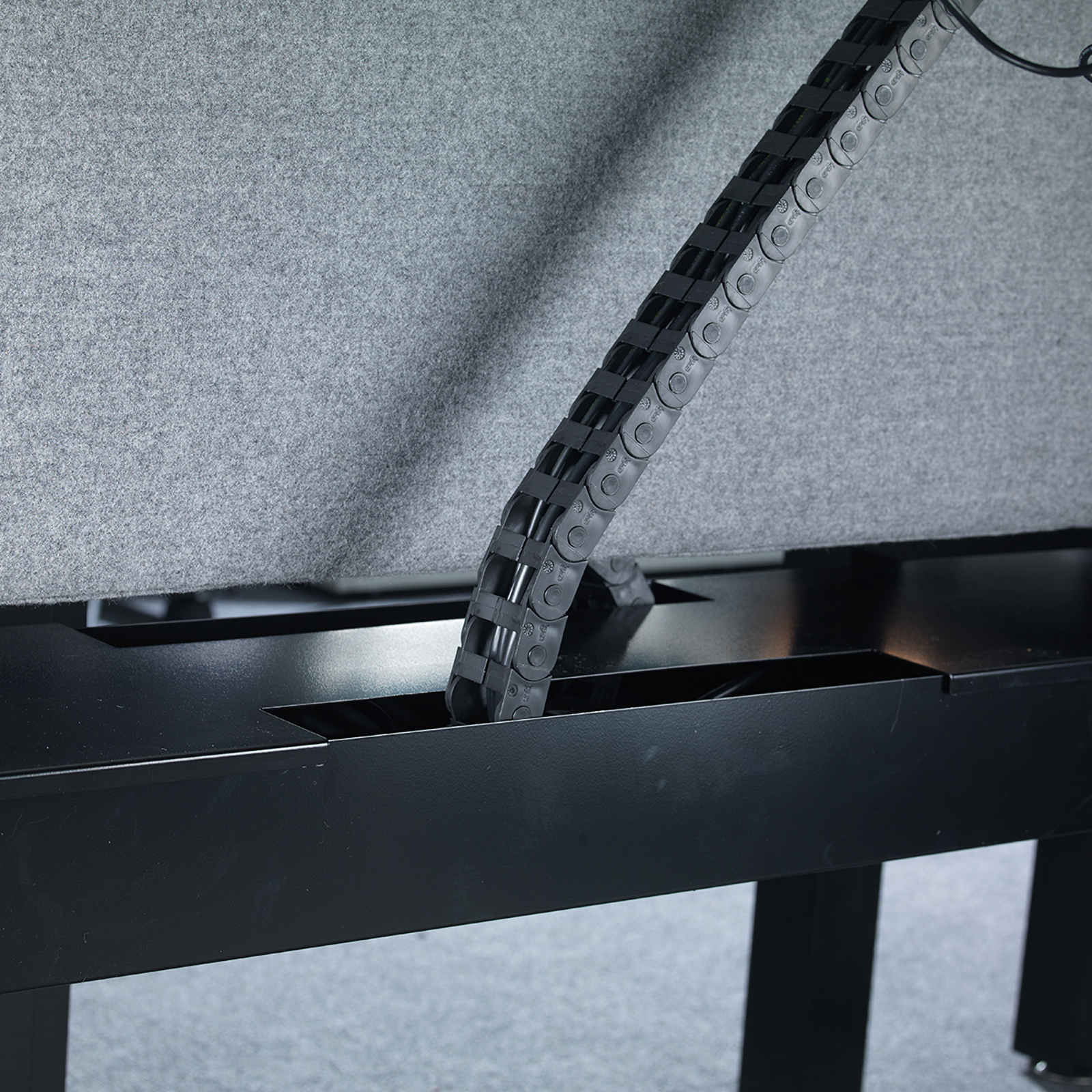 Elev8 vertical cable chain for back-to-back desks